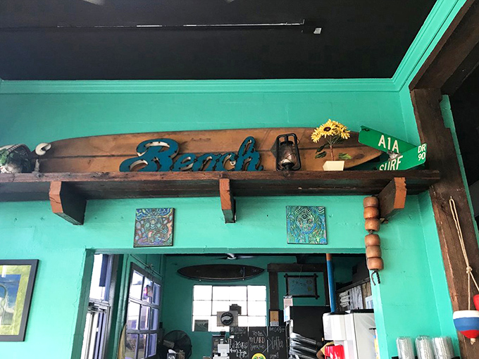 Beach-themed d&eacute;cor that doesn't hit you over the head with a surfboard. That turquoise wall color should be bottled and sold as "Florida Happiness."