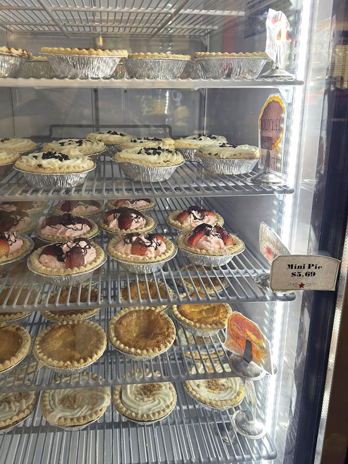 A dessert case that stops conversations mid-sentence. Those mini pies aren't just desserts&mdash;they're individual works of art waiting to be devoured.