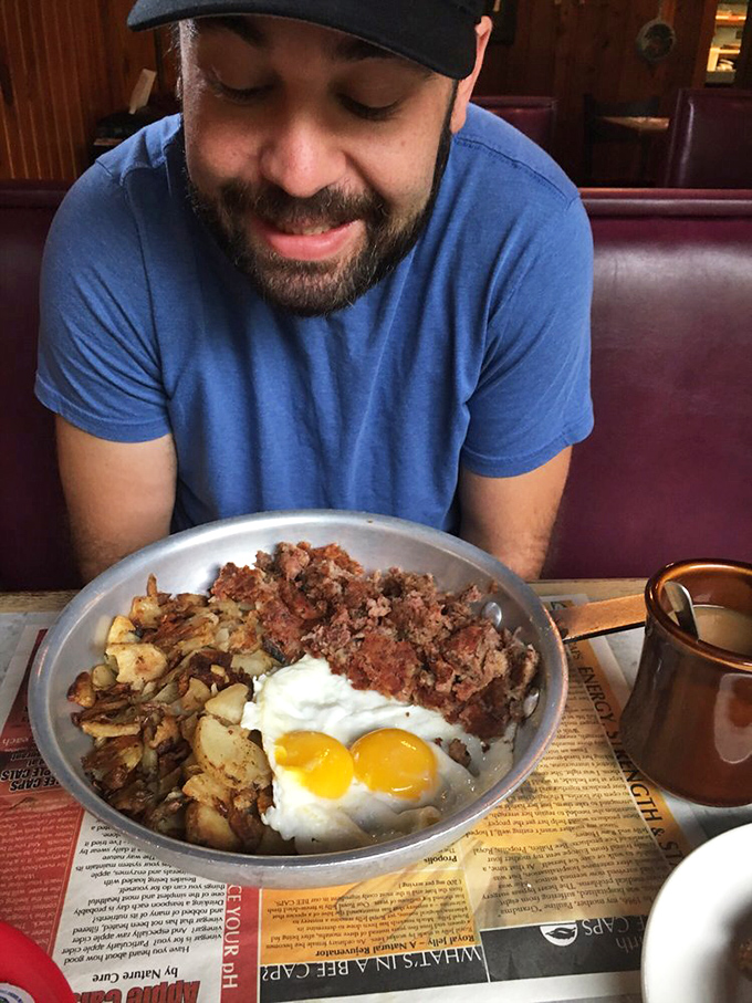 Corned beef hash with sunny-side-up eggs&mdash;a breakfast that makes you understand why people cross county lines at dawn for a meal.