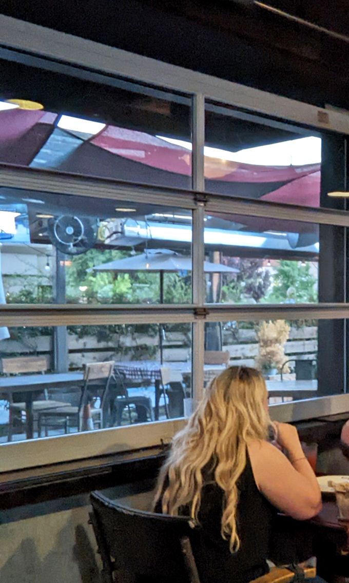 The indoor-outdoor flow creates a California barbecue experience that feels both sophisticated and down-home. Even the view comes with a side of ambiance.