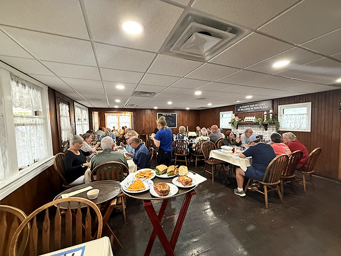 A bustling dining room filled with happy patrons proves that in a world of food trends, comfort classics will always draw a crowd.
