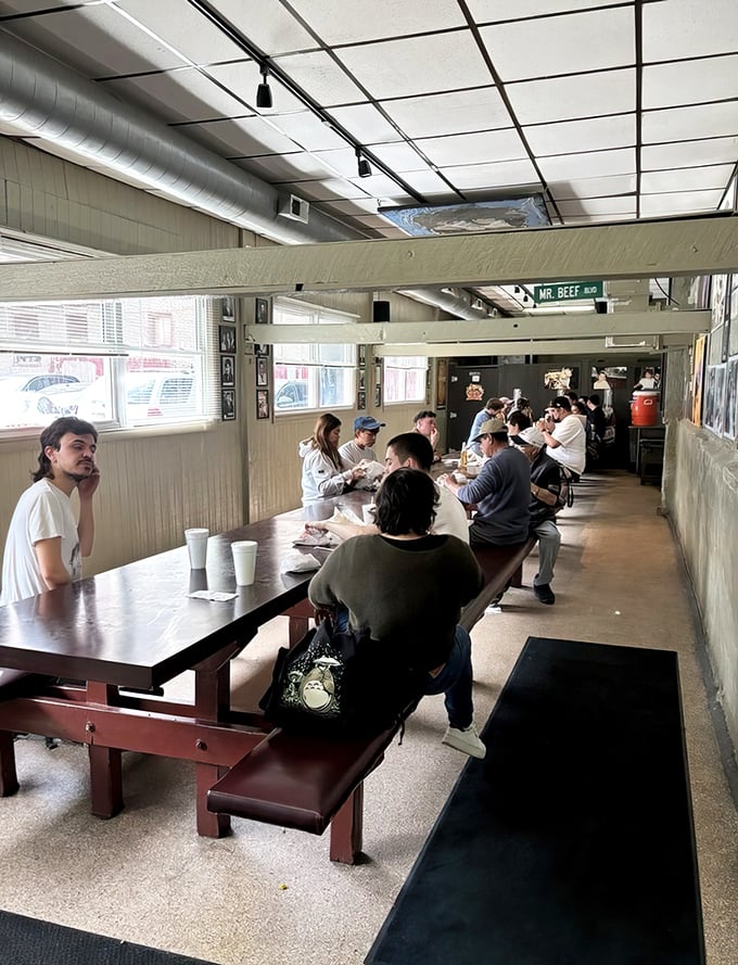 Lunchtime at Mr. Beef: strangers united by the universal language of "this is so good I can't talk right now."