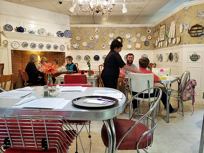 The cafe in action &ndash; where vintage-loving diners gather among decorative plates and warm brick to refuel for the next round of treasure hunting.