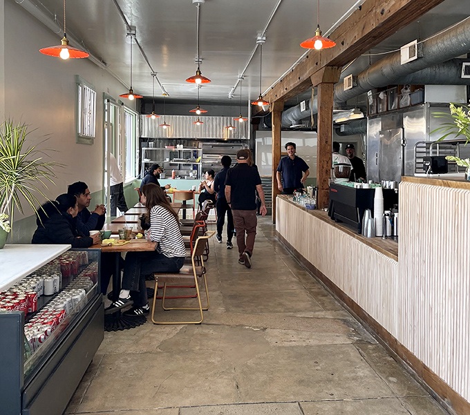 The narrow space buzzes with energy as diners savor their finds, proving good food needs no elaborate staging&mdash;just honest flavors.