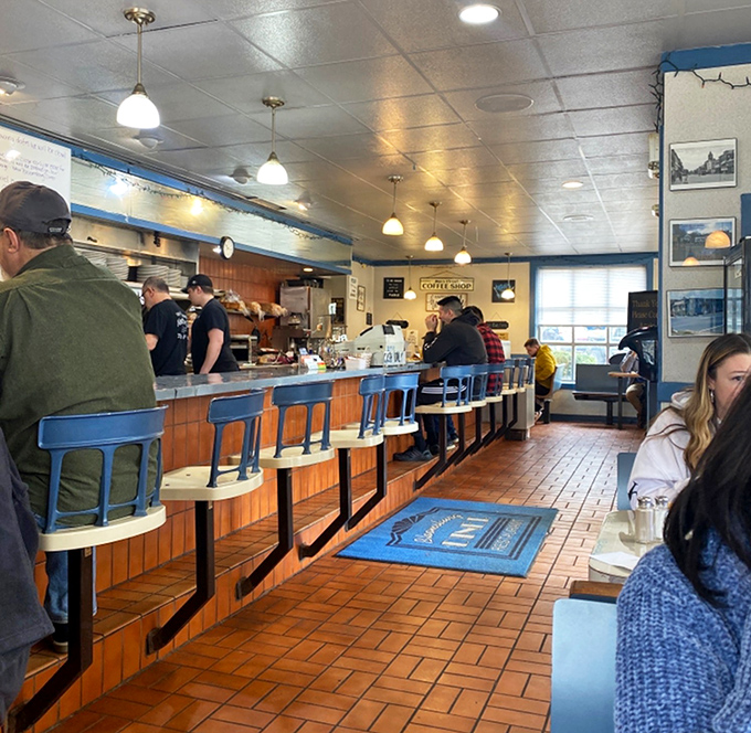 The morning ballet of diners and servers &ndash; a choreographed routine perfected over countless cups of coffee.
