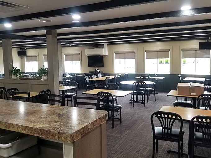 Empty tables waiting for the lunch rush &ndash; each one holding the promise of conversations, celebrations, and meals that become memories. 