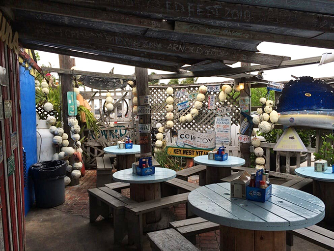Outdoor dining where cable spools become tables and atmosphere comes free of charge. The buoys aren't decoration&mdash;they're witnesses.
