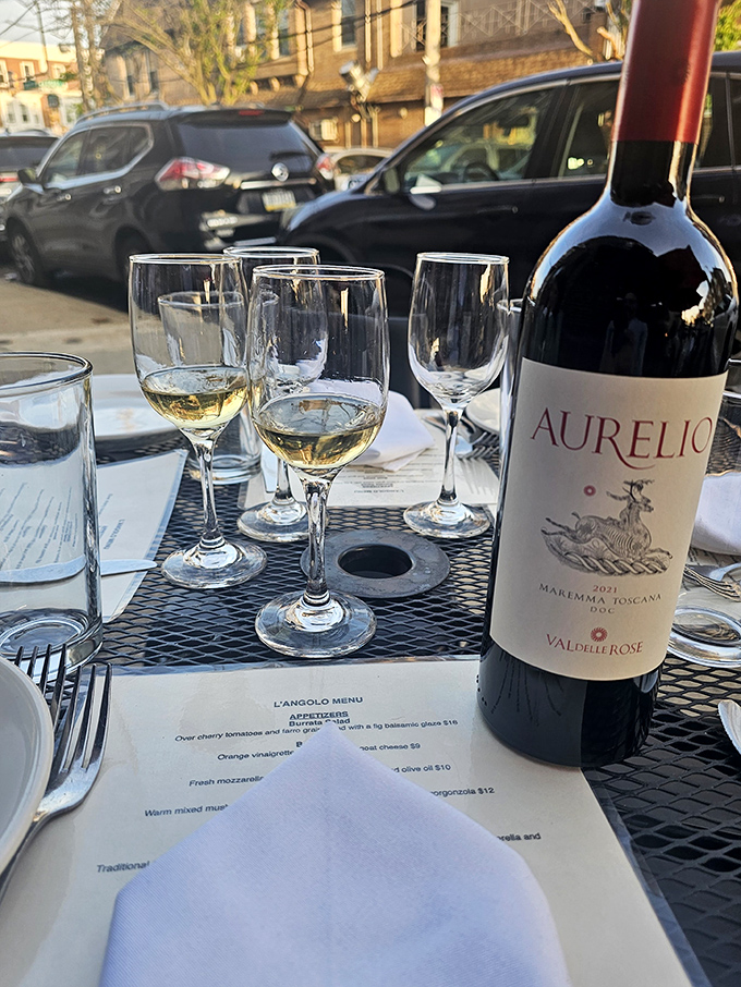 Sidewalk dining where city energy meets Italian tranquility, creating the perfect urban dining soundtrack experience.