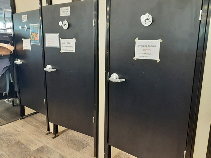 The moment of truth awaits behind these no-nonsense doors, where lighting is honest but the prices are forgiving.