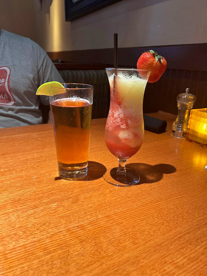 
Cocktails that look as good as they taste&mdash;a refreshing prelude to seafood delights. That strawberry garnish isn't just pretty&mdash;it's practically a serving of fruit. 