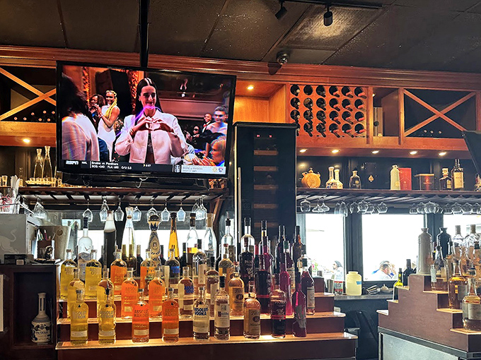 A liquid rainbow of spirits lines the bar, promising cocktails that might have you joining the napkin-throwing festivities before your entr&eacute;e arrives.