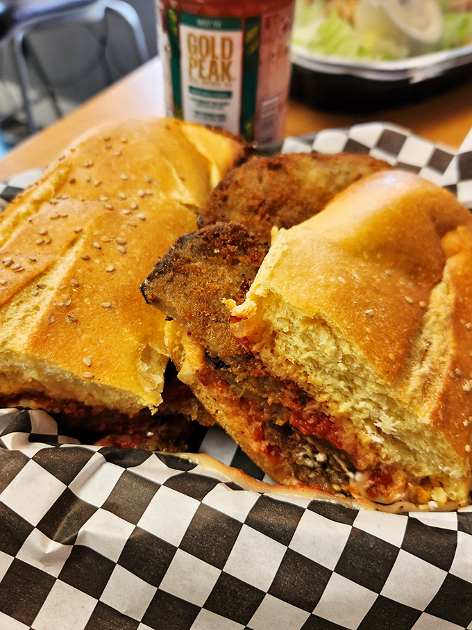 This isn't just an eggplant parm sandwich&mdash;it's architecture. Golden bread supporting layers of breaded eggplant and sauce in perfect harmony.