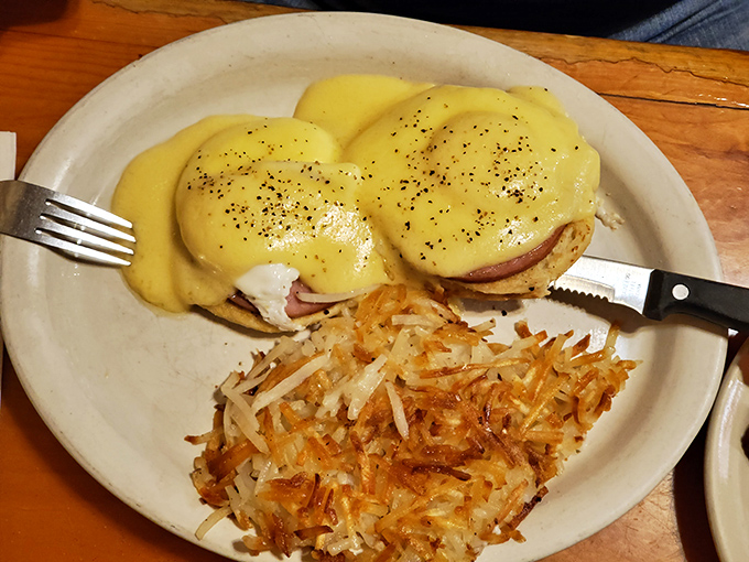 Eggs Benedict that would make the Pope jealous. Hollandaise sauce cascades like a yellow waterfall over perfectly poached eggs and Canadian bacon.