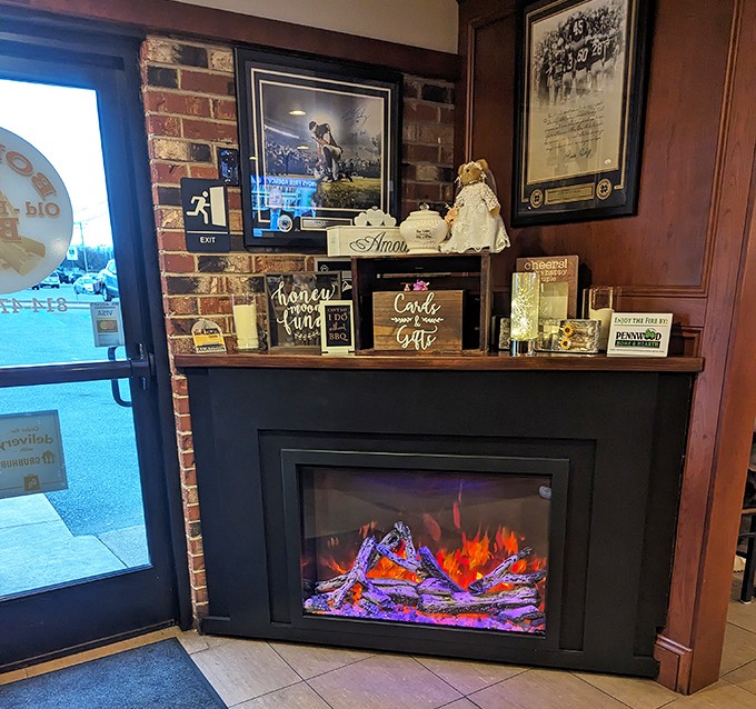 The electric fireplace adds cozy ambiance – because nothing complements the thought of smoked meat like the sight of flames.
