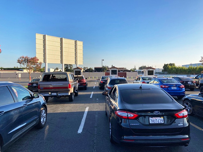The approach to screen two, where anticipation builds with every parking space you pass.