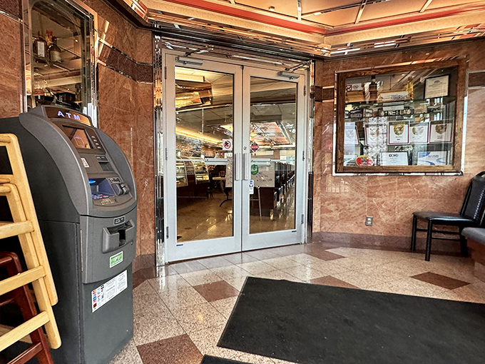 The entrance to breakfast paradise, complete with an ATM for those who forgot that happiness sometimes requires cash.