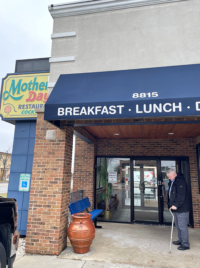 The welcoming entrance with its cheerful signage promises three square meals and cocktails too. A beacon of comfort food on Cermak Road.