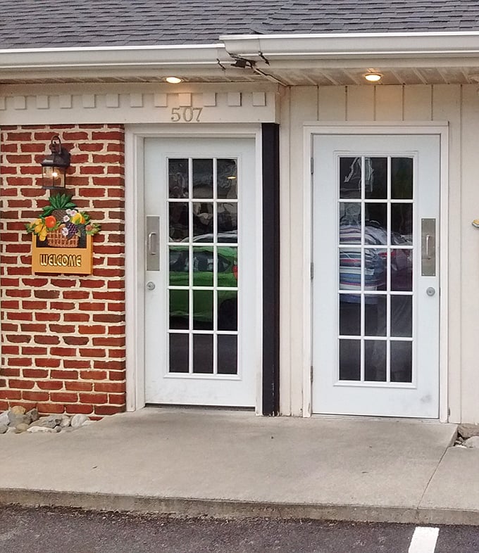 The entrance says "come as you are"—no dress code, no pretense, just the promise of honest food waiting on the other side of those doors.