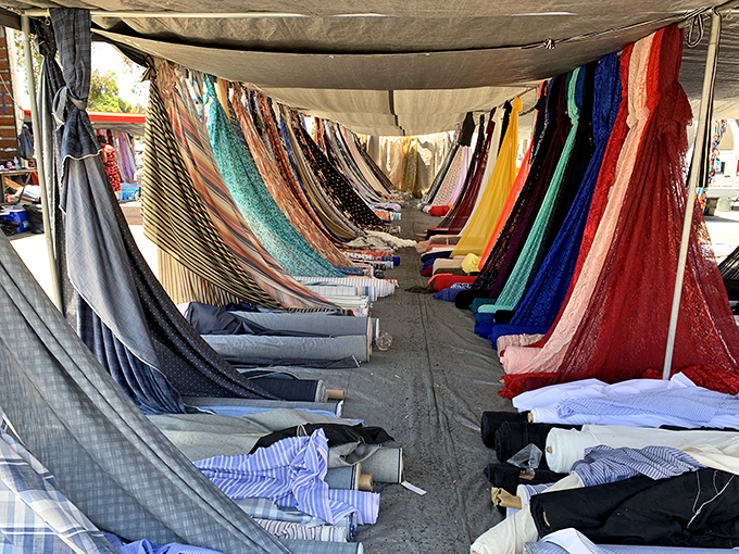 Fabric display that doubles as modern art. This mesmerizing textile tunnel creates a kaleidoscope effect that would make Joseph and his technicolor dreamcoat jealous.
