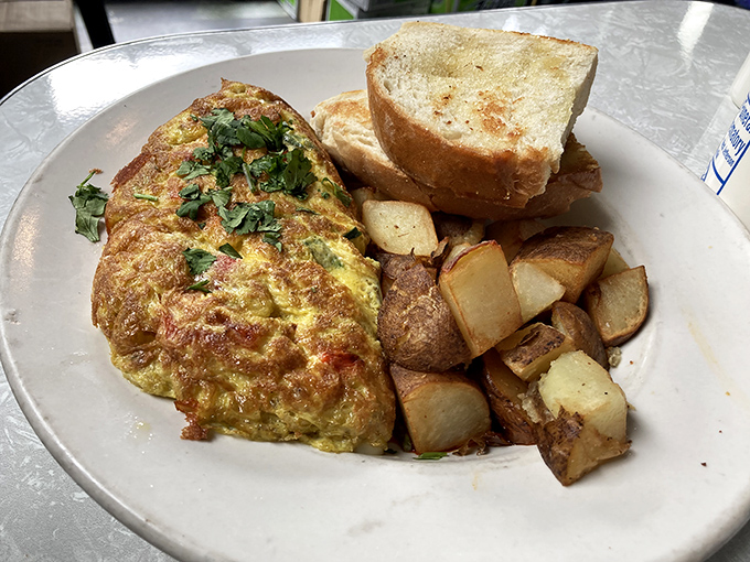 This omelet doesn't just sit on the plate&mdash;it lounges confidently, knowing it's about to make your breakfast dreams come true.