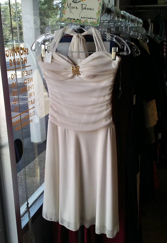 That elegant cream dress isn't just formal wear&mdash;it's someone's wedding, prom, or special night out waiting for its next dance under the stars.