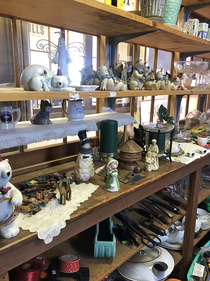 A menagerie of porcelain polar bears and figurines awaits adoption, ready to add character to someone's curio cabinet or bookshelf.