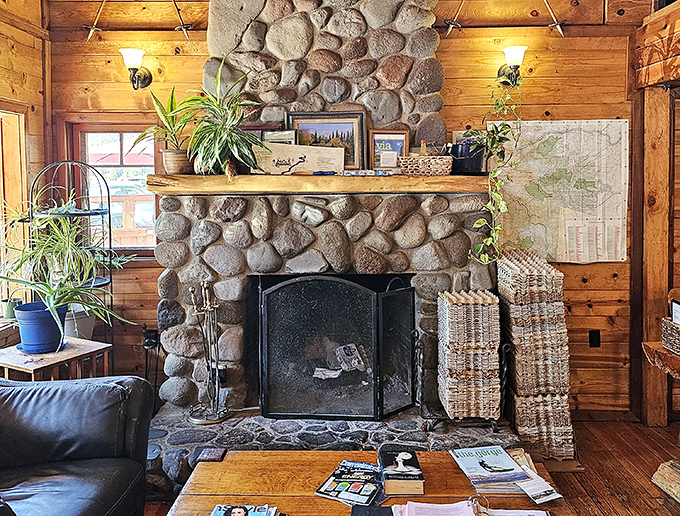 Another view of the magnificent stone hearth &ndash; where winter meals taste better as flames dance and snow falls silently beyond the windows.