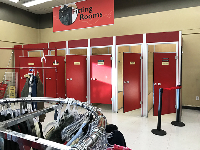 The fitting room corridor glows with promise. These red doors have witnessed countless "maybe" moments transform into triumphant "definitely yes!" discoveries.