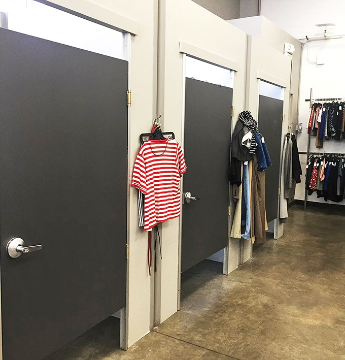 Fitting room reality checks: where "maybe" turns to "definitely" or "absolutely not." That striped shirt hanging outside is sending mixed signals.