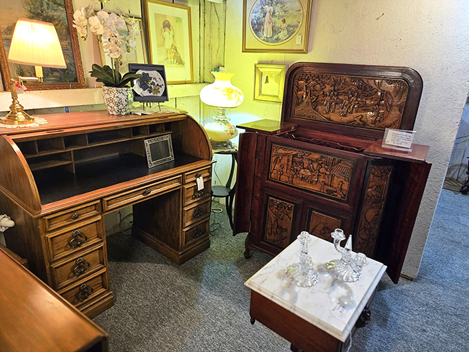 This exquisite roll-top desk and carved cabinet pair beautifully, like peanut butter and jelly for your vintage-loving soul.
