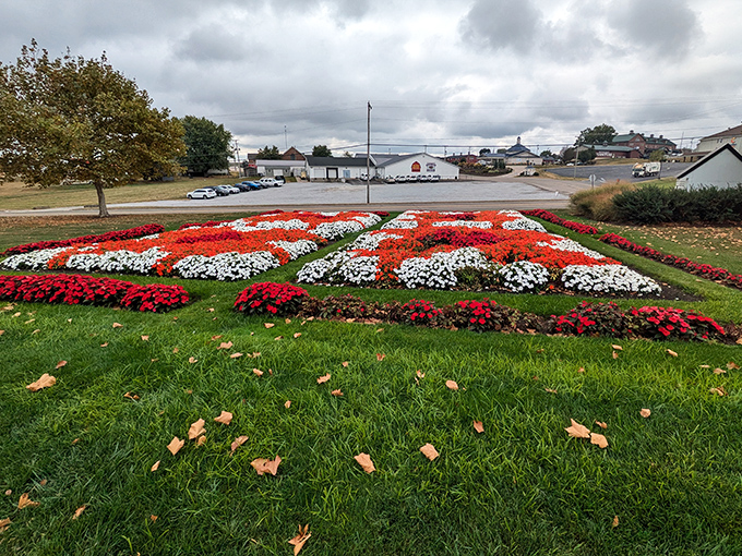 A quilt pattern recreated in flowers greets visitors, proving that in Amish country, even the landscaping celebrates traditional craftsmanship.