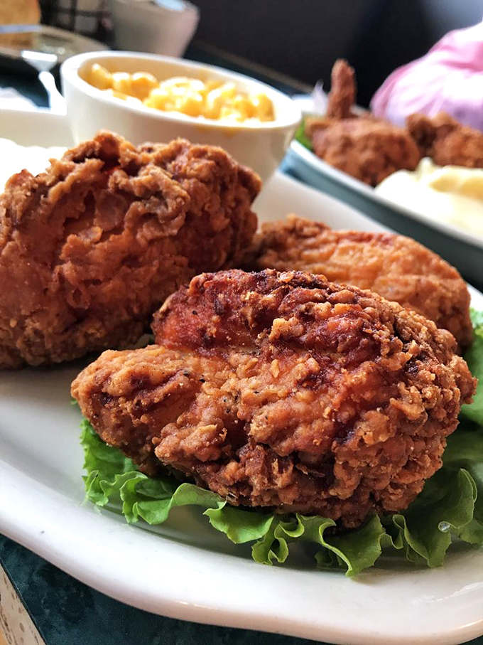 Fried chicken that would make Colonel Sanders weep with jealousy &ndash; crispy, juicy, and seasoned so perfectly you'll forget hot sauce exists.