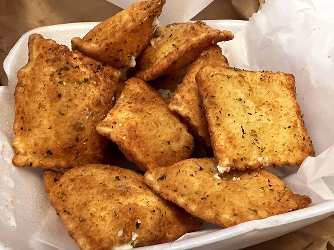 Fried ravioli squares &ndash; crispy on the outside, molten on the inside &ndash; proof that Beto's magic extends beyond their signature pizza.