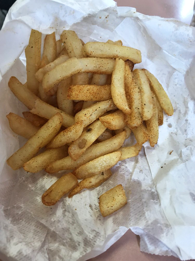 These seasoned fries aren't just a side&mdash;they're supporting actors that occasionally steal the scene with their perfect balance of crispy exterior and fluffy interior.