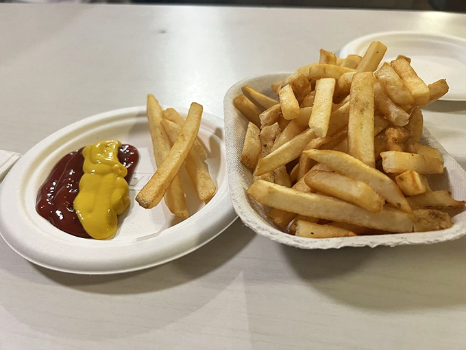 Fries that understand their supporting role&mdash;crispy, golden, and ready for a dip in ketchup, mustard, or both if you're feeling adventurous.