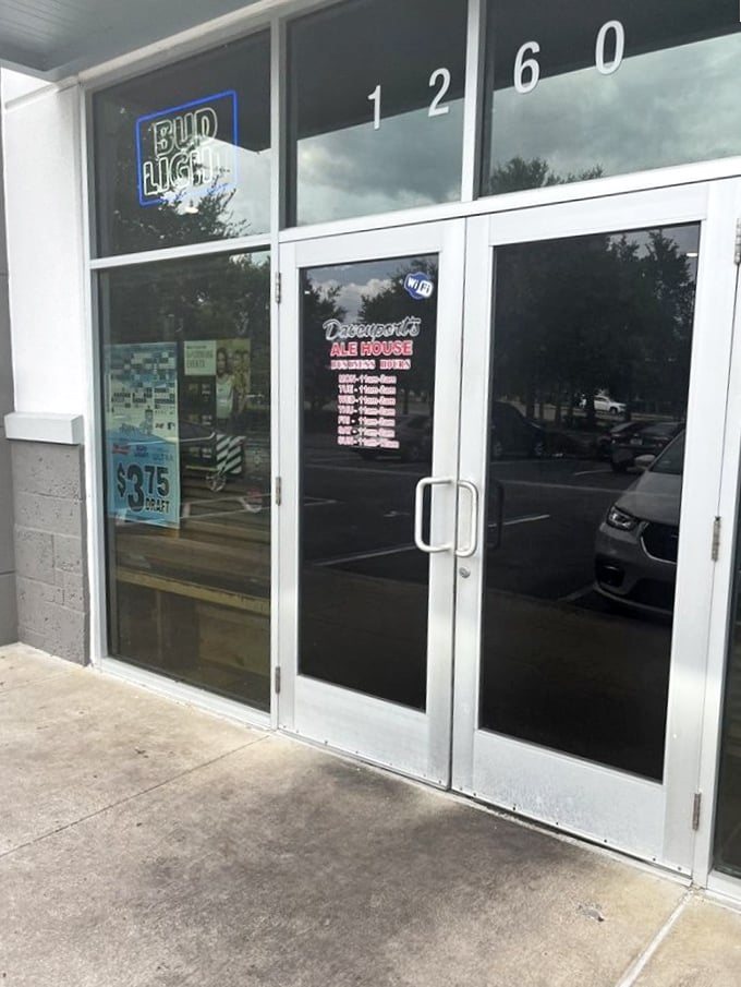 The entrance &ndash; where hunger goes in and satisfaction comes out. Those hours posted mean business, just like their kitchen.