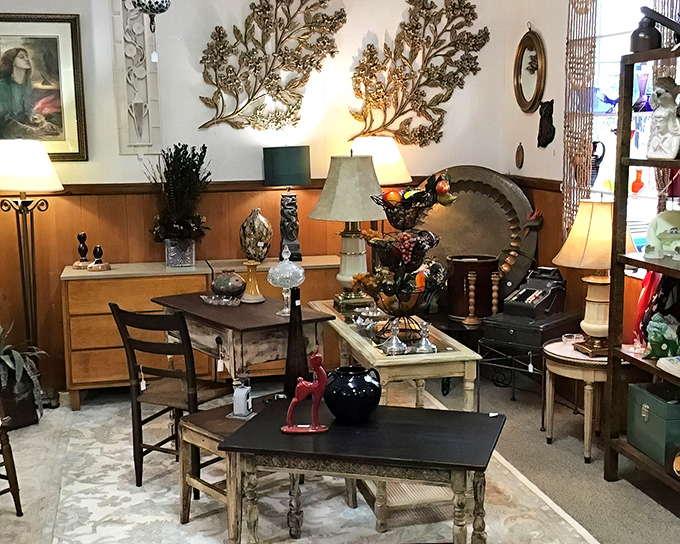 A furniture vignette worthy of a movie set. Those metal wall sculptures would make any mid-century modern enthusiast weak at the knees.