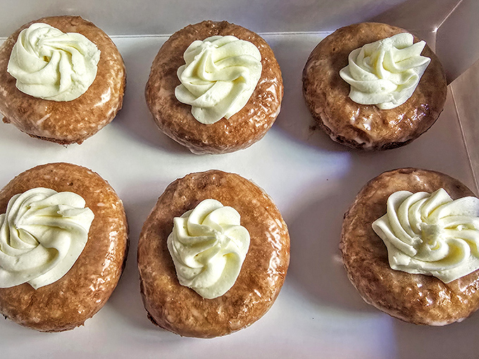 Glazed donuts with cream centers that make grown adults weak at the knees. The perfect spiral of frosting says "someone cares."