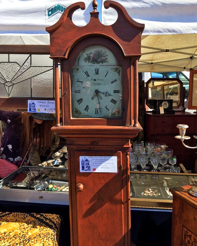 Time stands still, literally. This grandfather clock has witnessed decades of life's moments, now waiting patiently for its next home.