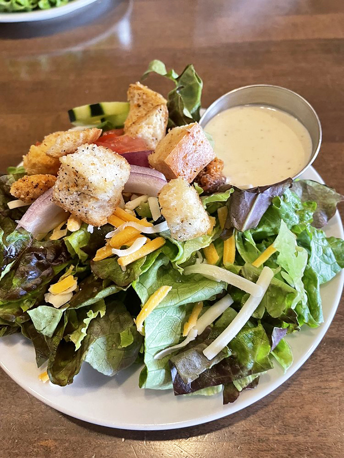 A salad that doesn't apologize for being healthy. Fresh, crisp, and vibrant—it's like the opening act that surprisingly steals the show.