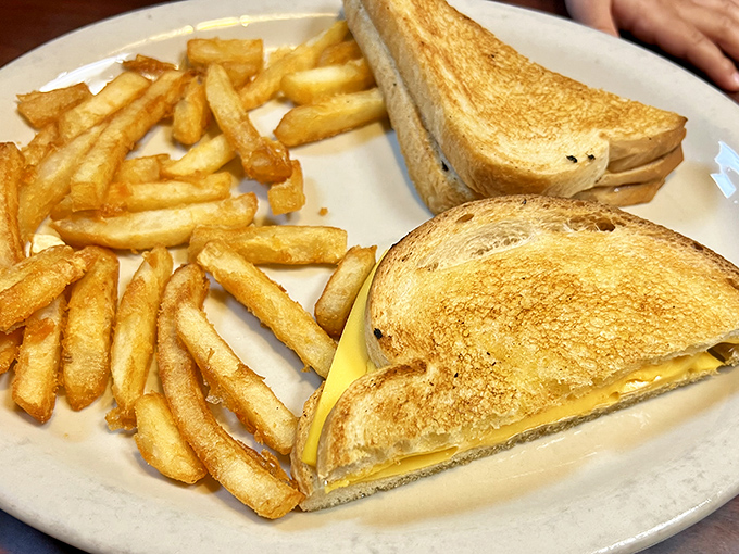 The grilled cheese&mdash;childhood nostalgia upgraded with perfectly golden bread and fries that could make a Frenchman weep with joy. 