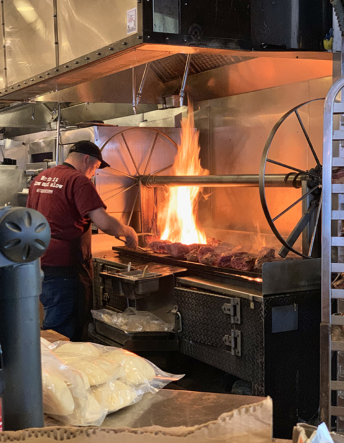 The open flames tell the real story &ndash; where pitmasters work their magic over glowing coals and dreams.