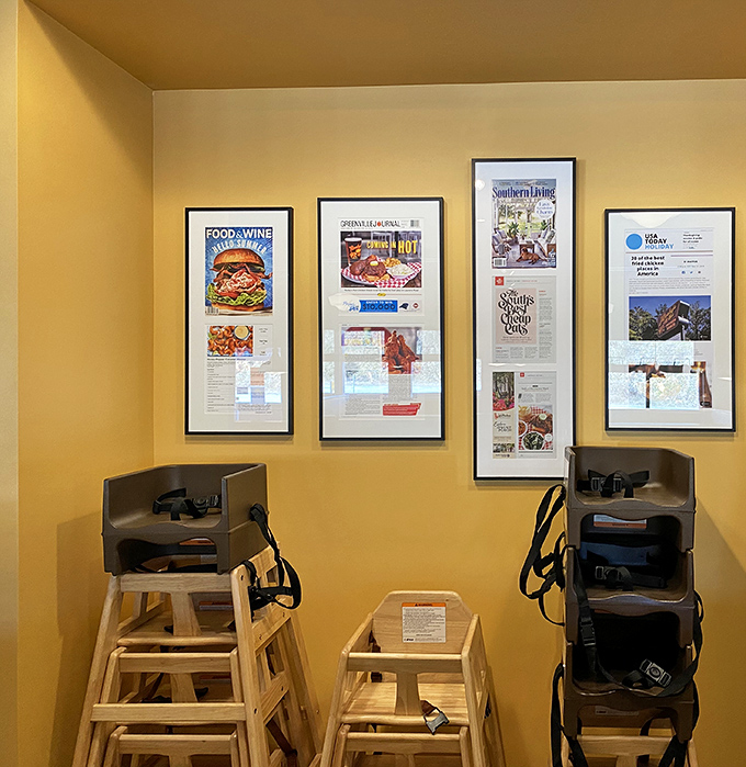 Press clippings tell the story of Rocky's rise to chicken fame. Even the high chairs are ready for the next generation of spice enthusiasts.