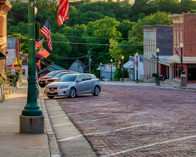American flags flutter above brick-paved streets, creating that perfect small-town ambiance that big cities spend millions trying to recreate.