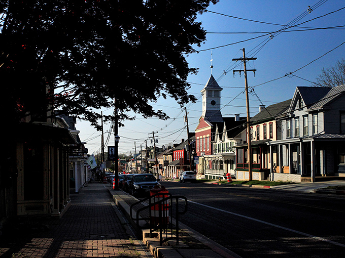 Late afternoon shadows stretch across Main Street, silhouetting the church steeple that's been Boonsboro's skyline centerpiece for generations.