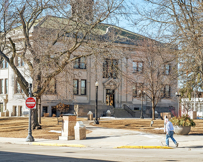 The Sauk County Courthouse anchors Baraboo's town square with dignified limestone presence, a testament to small-town civic pride and architectural ambition.