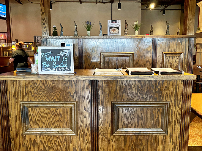 Please Wait to Be Seated really means "Prepare yourself for the deliciousness that awaits beyond this host stand." 