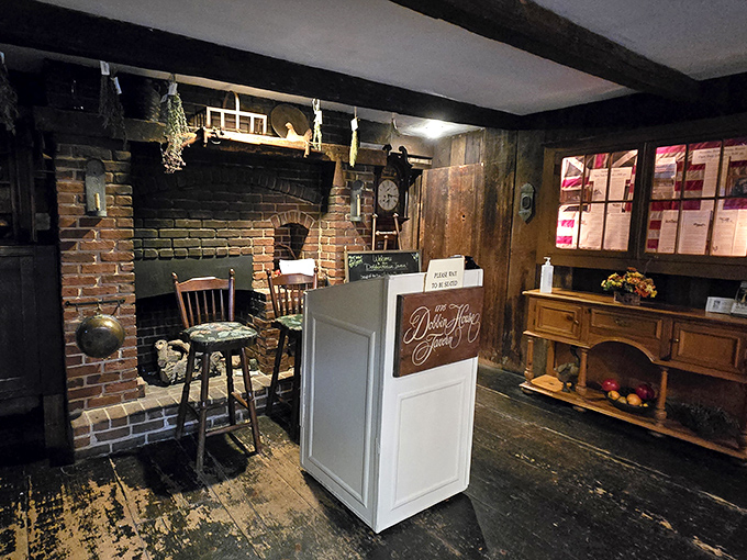 The gateway to gustatory delight&mdash;where modern hospitality meets colonial charm at the hostess stand that's witnessed countless eager arrivals.