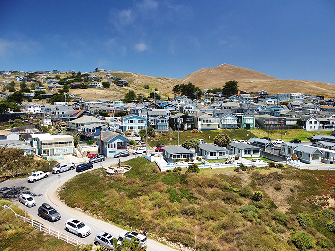 Beach cottages perch above the dunes, living everyone's retirement dream one sunset at a time.