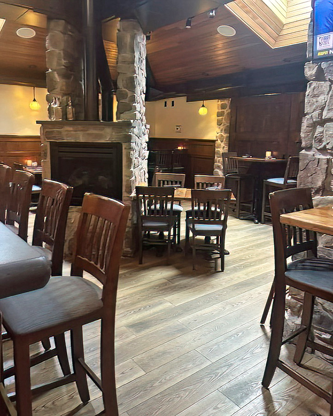 Stone pillars and warm lighting create an atmosphere where every meal feels like a celebration.